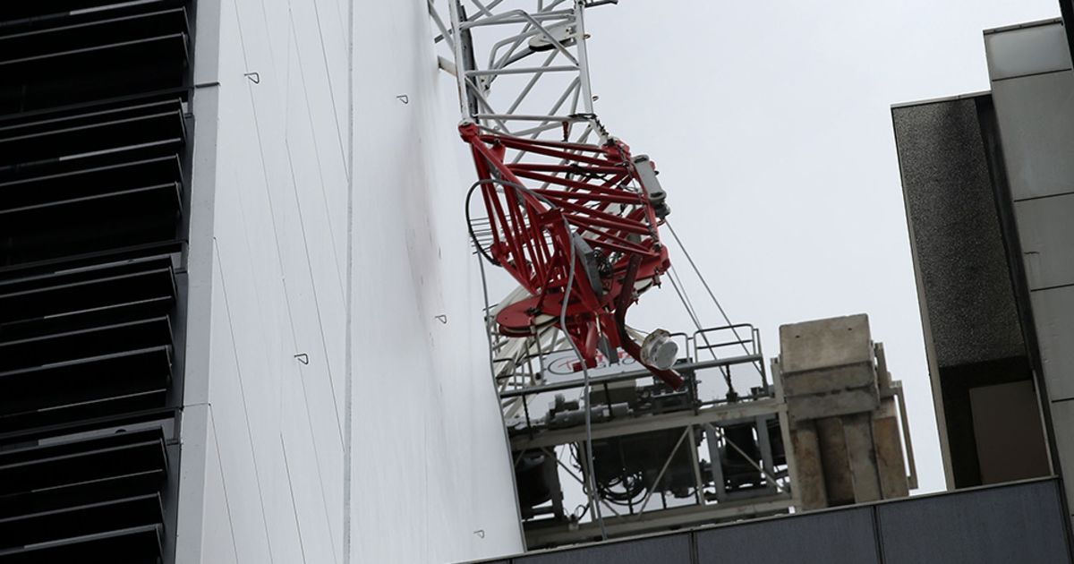 North Sydney crane collapse leaves workers dangling from building