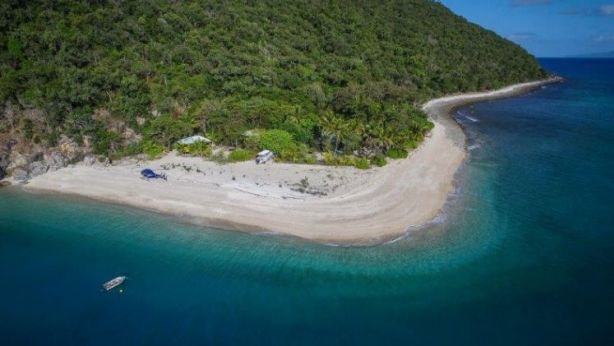 The couple that owns the only home on a secluded island in the Great ...