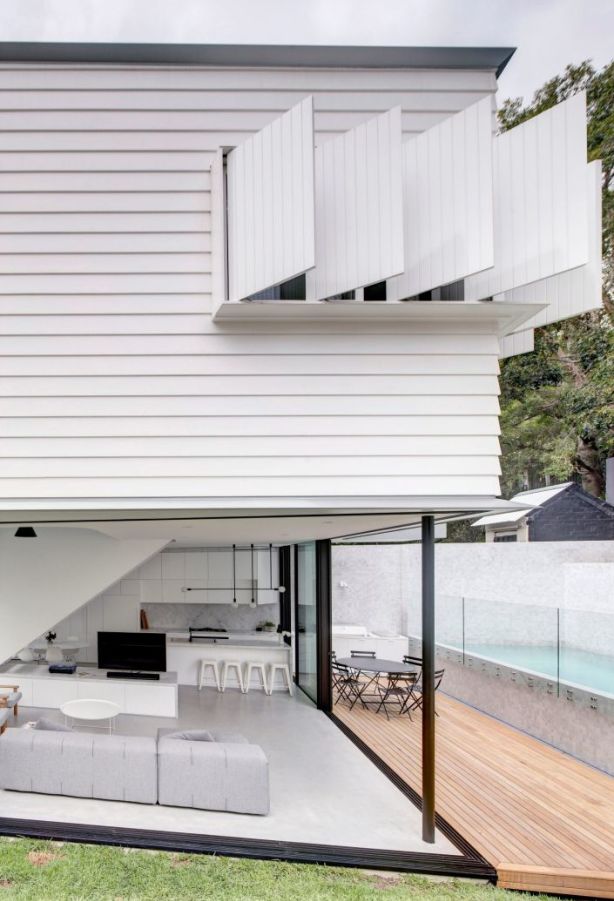 ‘Big and gregarious’: The weatherboard Peekaboo House on a wedge-shaped ...