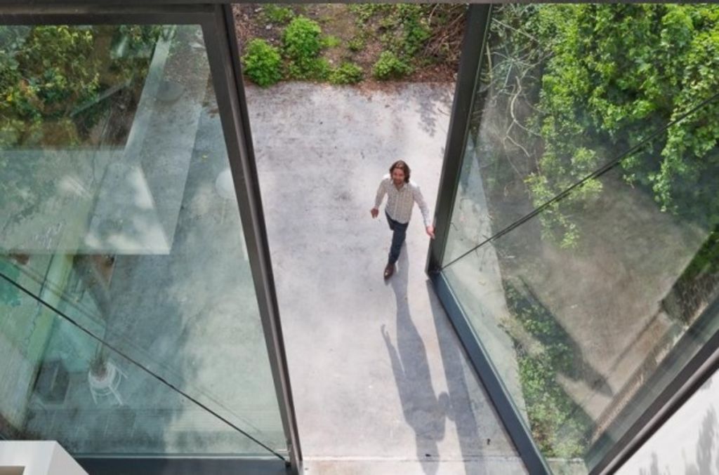 World's largest pivoting window designed by Belgian architecture studio ...