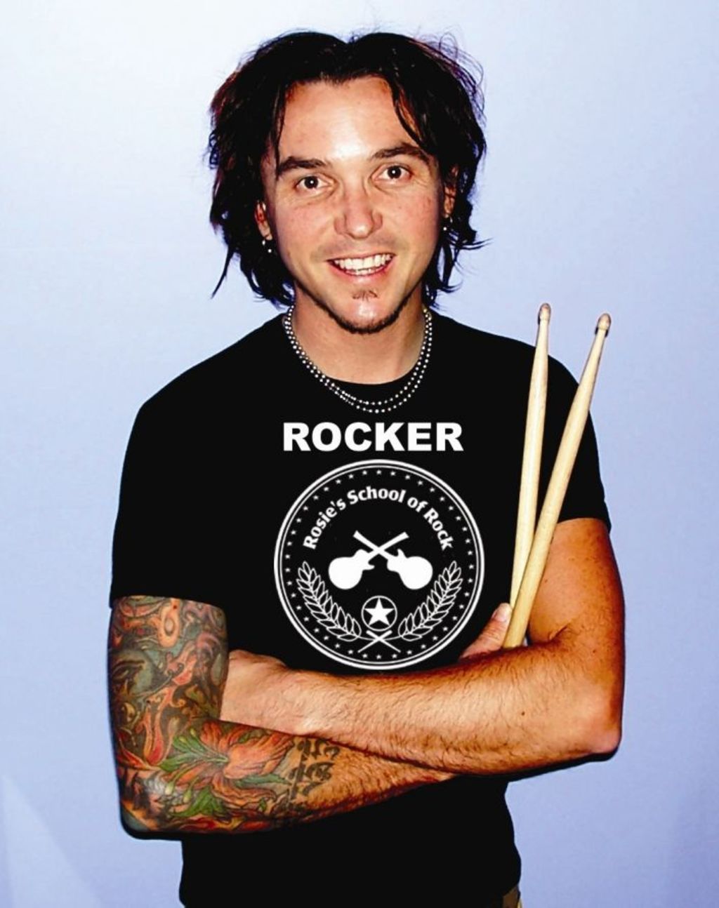 Drummer from The Screaming Jets is now an auctioneer