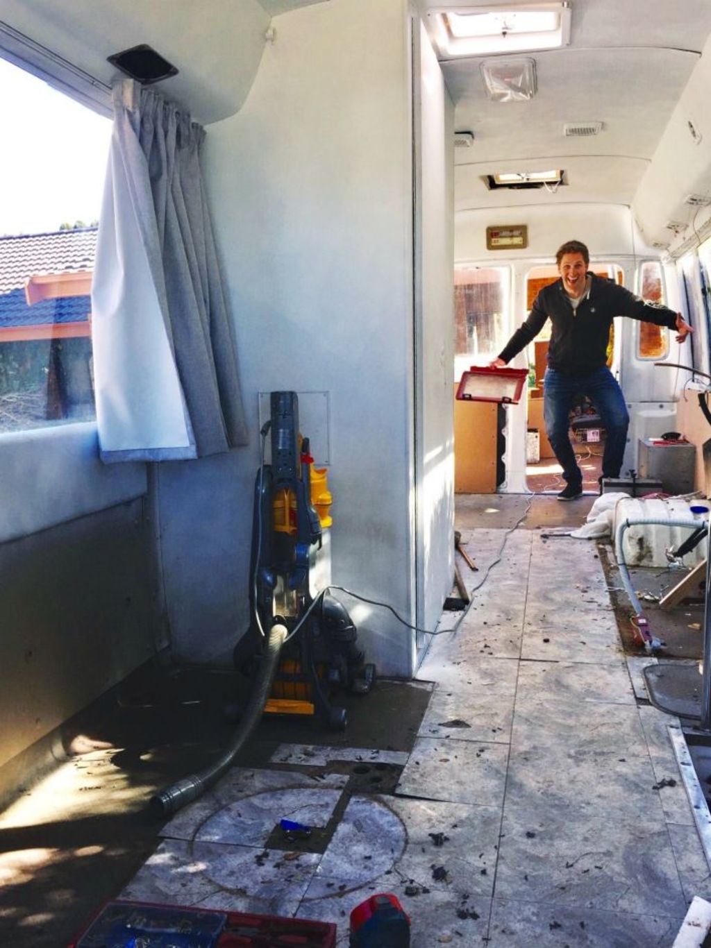 Living on a bus: One professional couple’s solution to the housing crisis