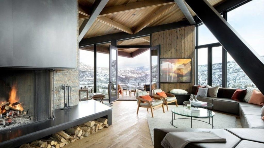 Architectural mountain house that takes its cue from the surrounding ...