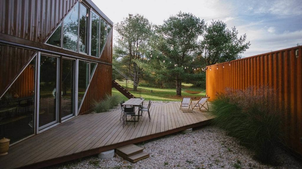 Amazing container house built from six containers with rooftop deck