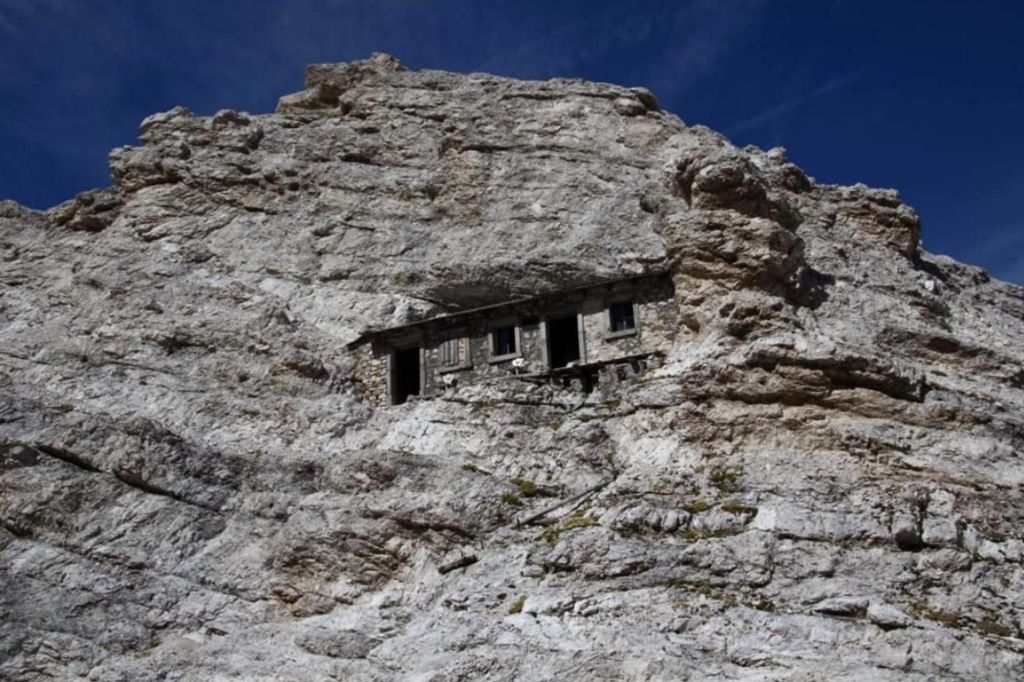 The world's loneliest house stuck on the side of a mountain, empty for ...