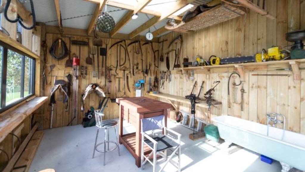 This ultimate New Zealand man cave has a million-dollar view