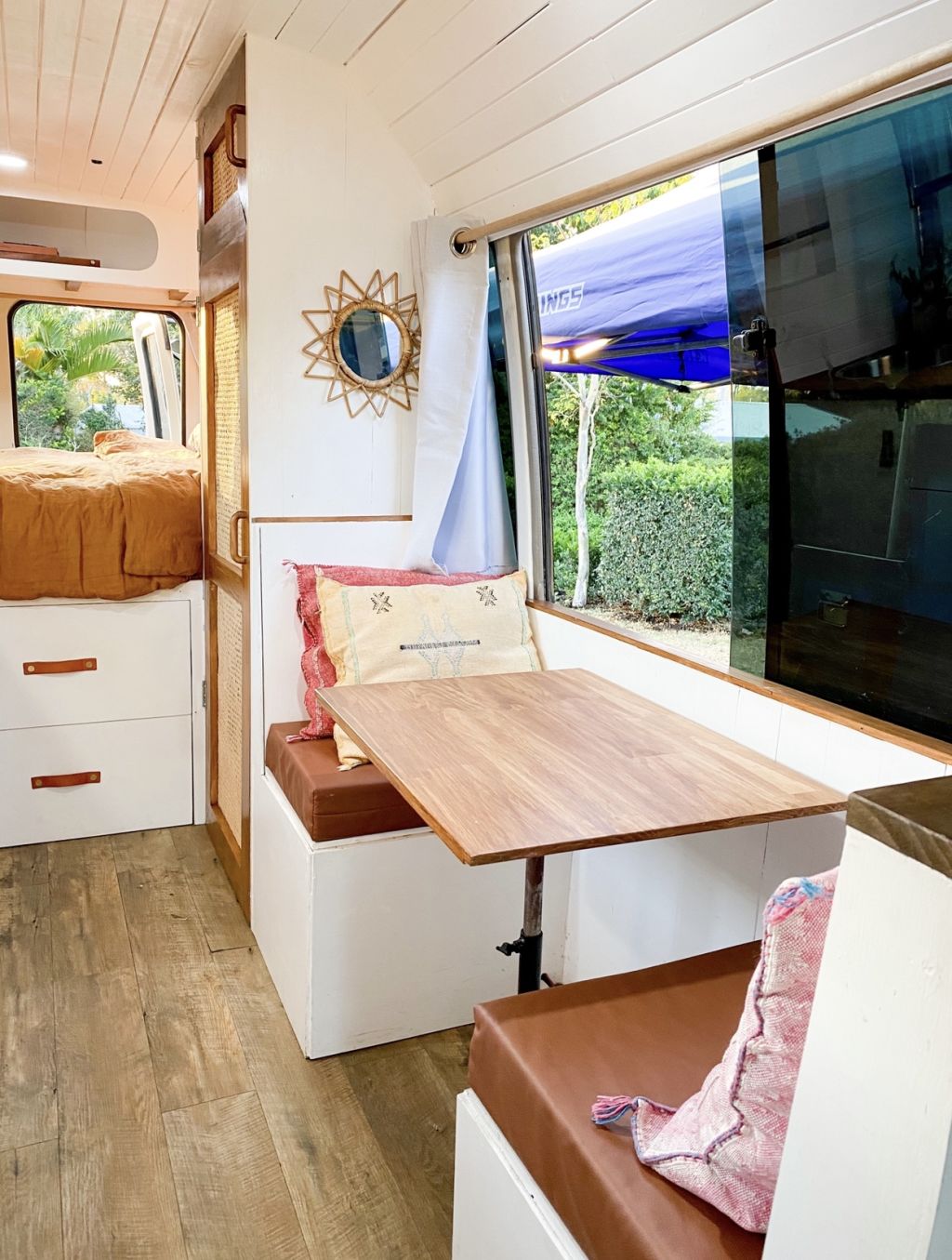 This young couple converted a $15,000 Toyota Coaster into their first home