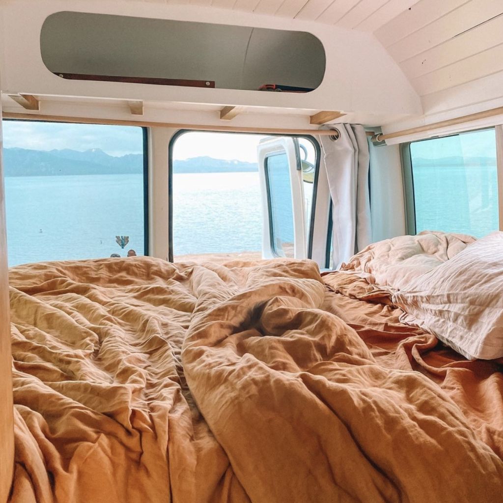 This young couple converted a $15,000 Toyota Coaster into their first home