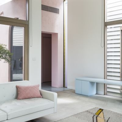 Family visits to Italy form the inspiration behind this pastel-hued home