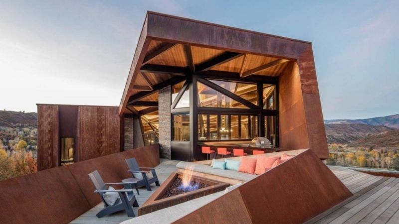 Architectural mountain house that takes its cue from the surrounding ...