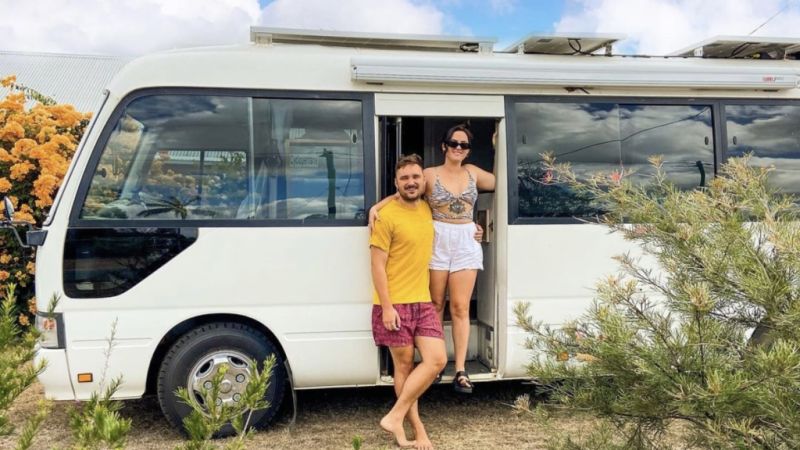 This young couple converted a $15,000 Toyota Coaster into their first home