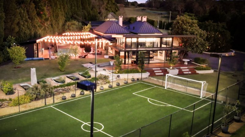 Soccer Field With A Dream House Blueprints