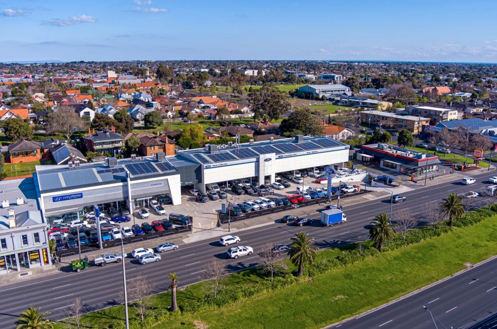 Big car yards cash in as housing drives up values