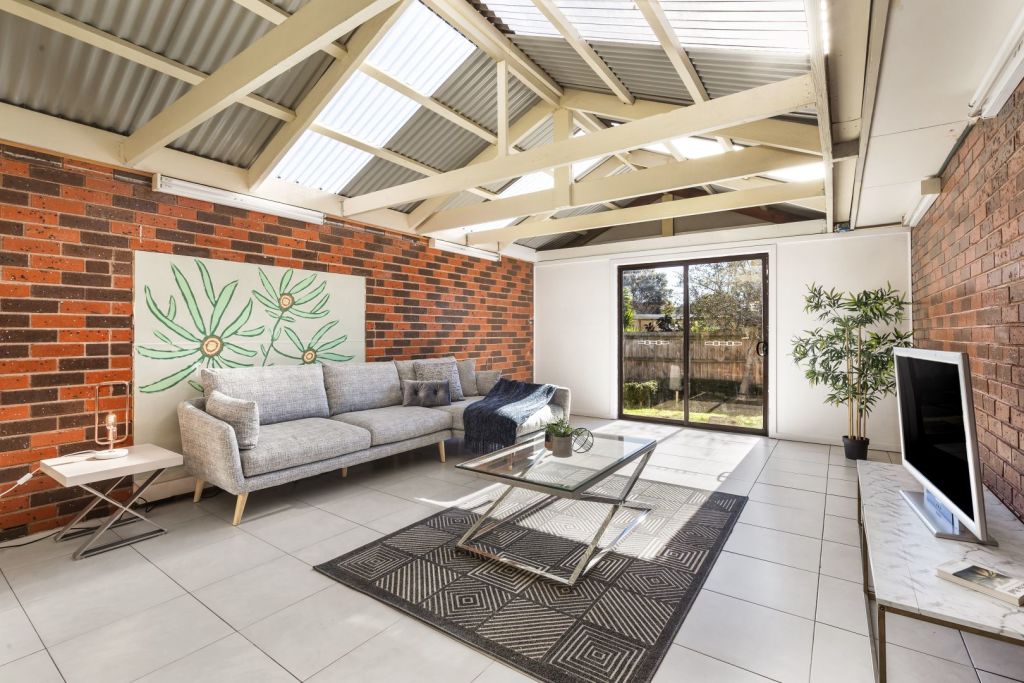 More buyers, big results as exclusive suburbs lead auction recovery