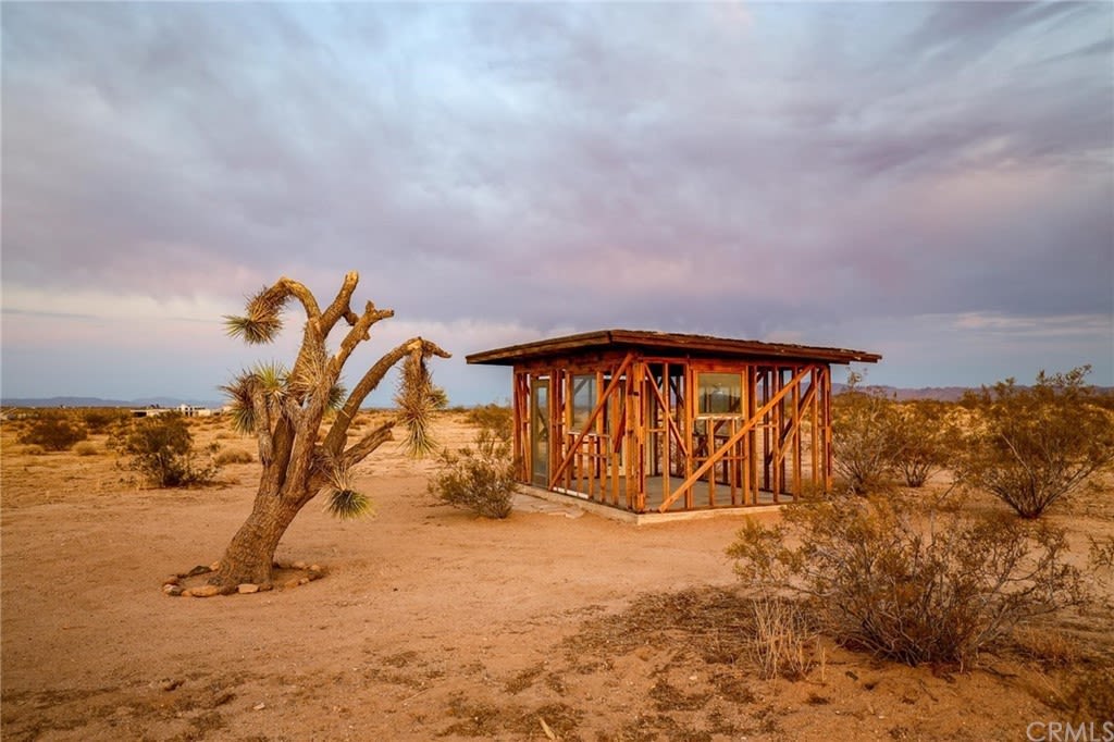 House in the middle of the desert with no walls or utilities listed for ...
